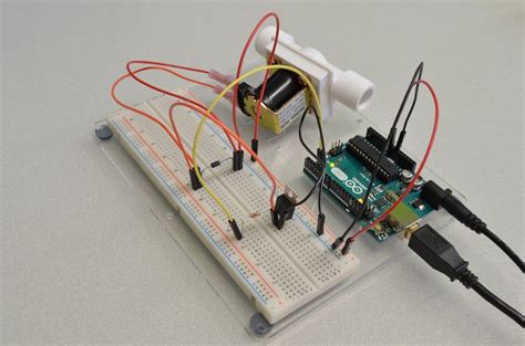 The Electronic Device Is Connected To Wires And Plugged Into An Ardula