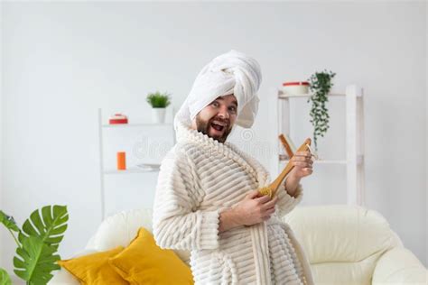 Funny Handsome Man Pretends To Play On Massage Brush As A Guitar Fun