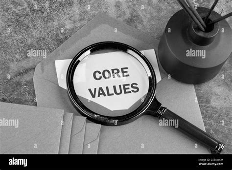 Core Values Ethics Concept Text Through A Magnifying Glass On A Piece