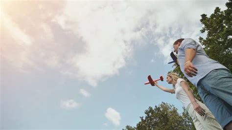 A Guy And A Girl Launch Toy Airplanes In Stock Video Pond5