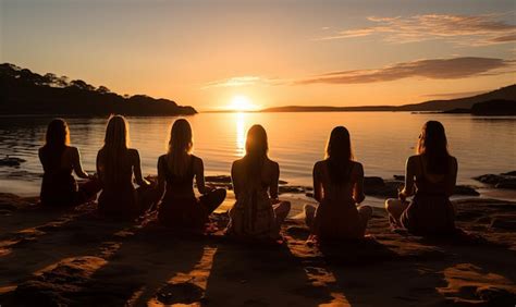 Premium Photo Group Of Women Sitting On Beach
