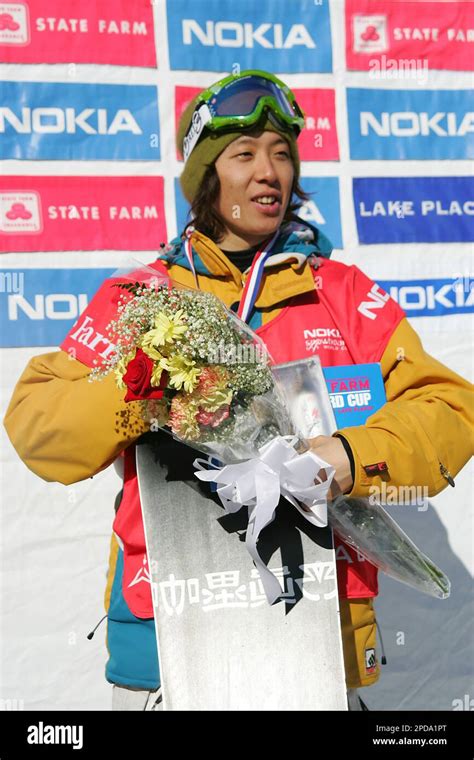 Third Place Winner Takihiro Ishihara Of Japan Smiles On The Medal Podium At The FIS World Cup