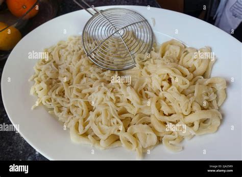 Swabian Cuisine Preparation Of Spaetzle For Cheese Spatulas Hand