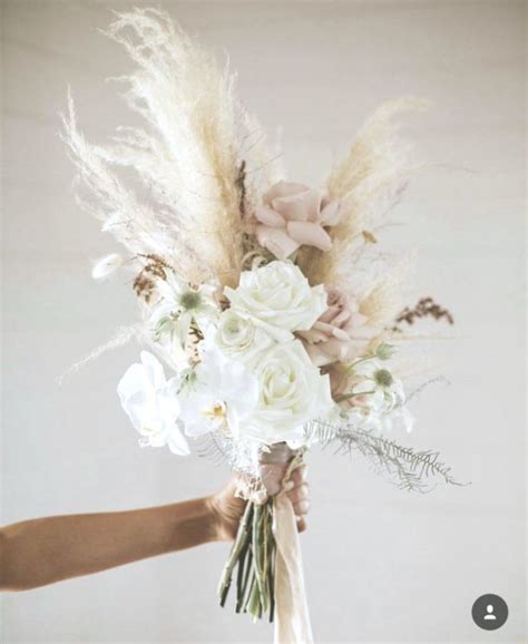 This Unique Bridal Bouquet Is Made With Pampas Grass And Huge White