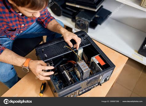 Man Connecting The Wires Indoors Stock Photo Ufabizphoto 399987388