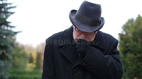 A Sick Old Man On The Streets Of The City He Has A Bad Cough He