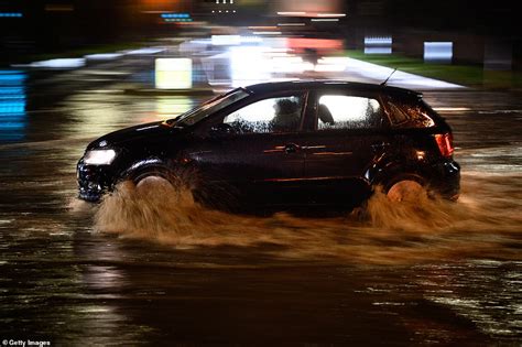 Cars Battle Flash Floods In London While Commuters In The South East