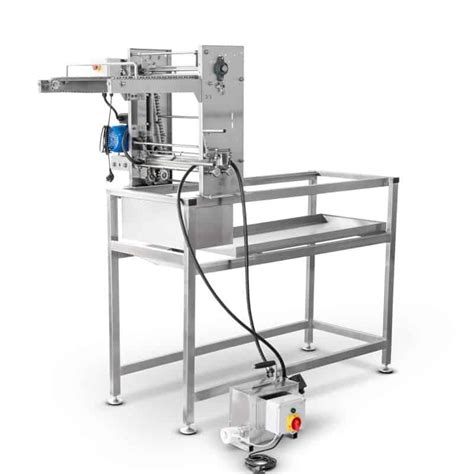 Chain Feed Uncapping Machine On A Stand Minima Line