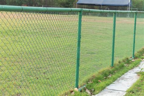 Metal Fence At Grass Football Field Stock Image Image Of Industry