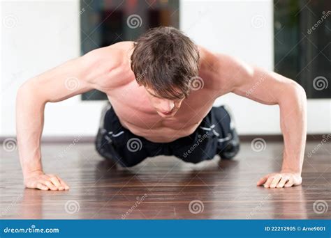 Man Doing Pushups In Gym Stock Image Image Of Building 22212905