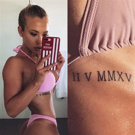Roman Numeral Tattoo Ribs