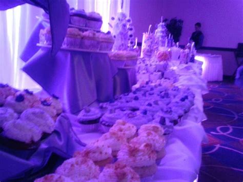 There Are Many Desserts On The Table At This Wedding Reception