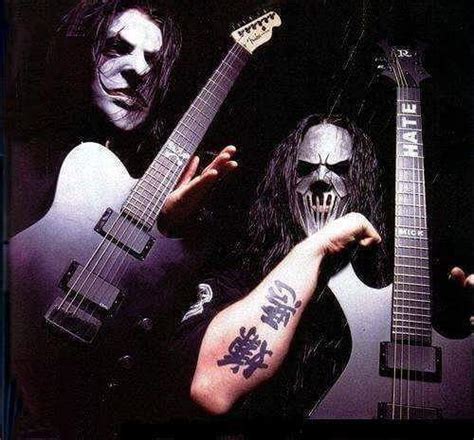 Jim Root And Mick Thomson Showing Off Their Instruments 2004 Rslipknot