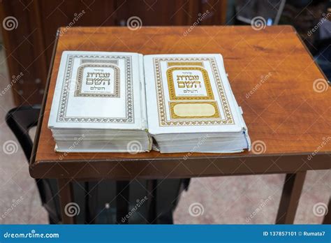 Jewish Holy Books Siddur On Wooden Stand At Synagogue In Cave Of