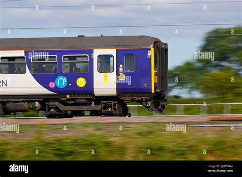 A British Rail Class 158 Seen Here Passing Through Colton Junction Near