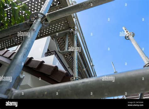 Modern House Construction With Scaffold Pole Platform New Build Domestic Building Steel