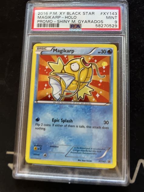 Mavin 2016 Pokemon Black Star Holo Promo MAGIKARP XY143 Shiny M Gyarados PSA 9