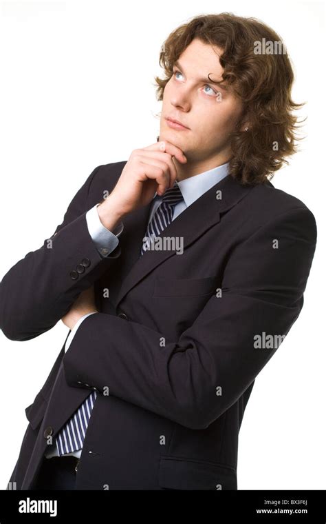 Portrait Of Pensive Businessman Touching His Chin While Thinking Stock