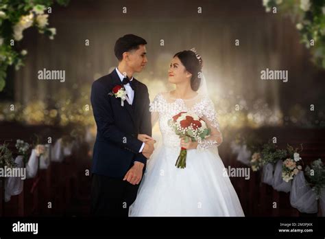 Bride And Groom On Wedding Day Beautiful Young Asian Couple Newly Wed Man And Woman Just