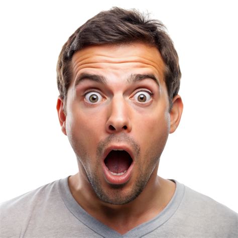 Shocked Young Man With Wide Eyes And Open Mouth Expressing Disbelief