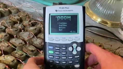 Guy Plays Doom On A Potato Powered Calculator
