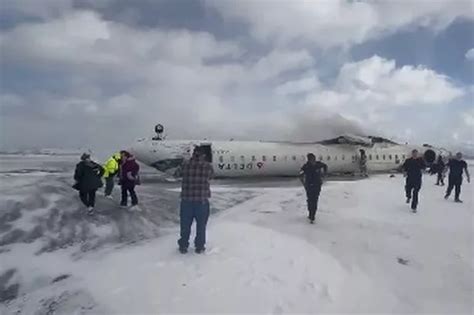 Footage Captures Terrifying Moment Passenger Crawls From Upside Down