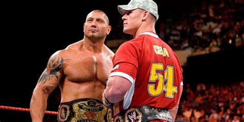 10 Pairs Of Wwe World Champions Who Won Tag Team Titles Together