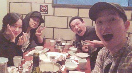Song Joong Ki Takes A Playful Photo With His Battleship Island Co