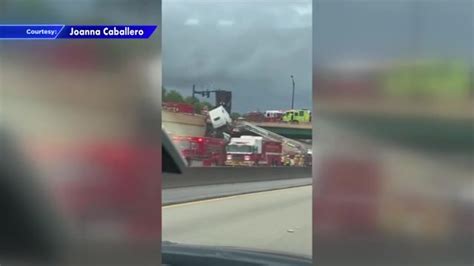 Truck Driver Rescued After Crash Leaves Cab Dangling Off Turnpike
