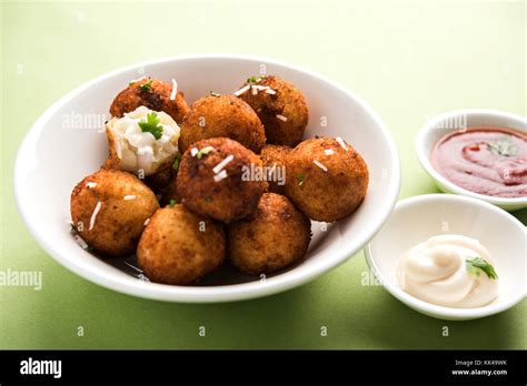 Fried Potato Cheese Balls Or Croquettes With Tomato Ketchup Selective