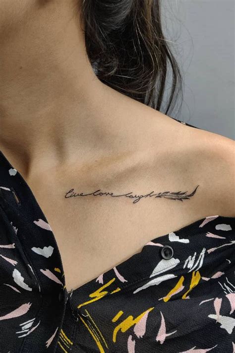 A Womans Chest With The Word Love Written In Cursive Writing On It