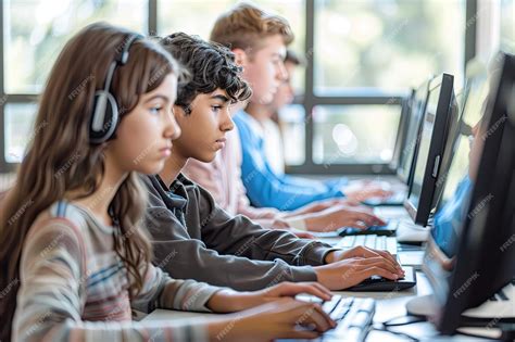 Young People In Classroom With Computers Premium Ai Generated Image