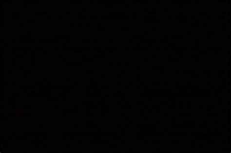 A Dark Photo Of A Background With A Text In The Bottom Right Corner