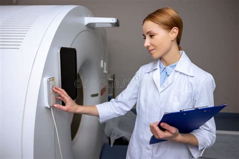 Female Doctor In Magnetic Resonance Imaging Or Computed Tomography Room