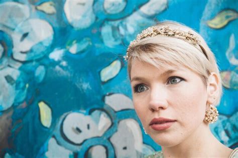 Premium Photo Close Up Of Thoughtful Woman Against Patterned Wall