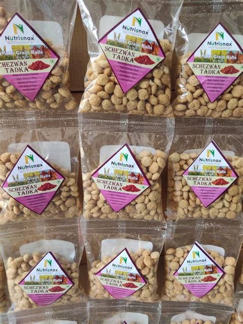 Nutrisnax Schezwan Tadka Multi Grain Jowar Bajra Ragiballs Packaging