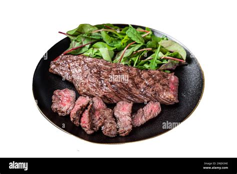 Juicy Grilled Machete Skirt Beef Meat Steak On Plate With Salad