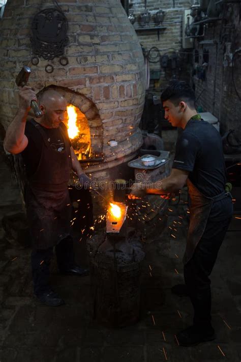Men Blacksmithes Forging A Knife Blade Editorial Photography Image Of Steel Forging 330724122