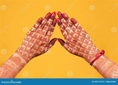 Ledy Feet And Hands In Heena For Wedding In White Background And