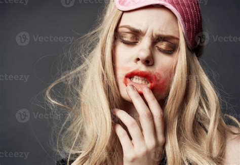 Woman With Pink Mask On Her Head Smeared Red Lipstick All Over Her Face