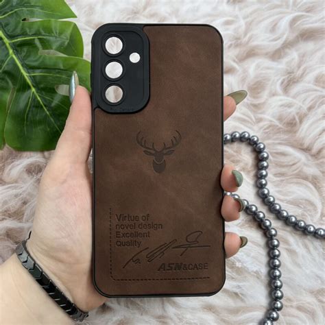 قاب گوشی Galaxy A15 سامسونگ چرمی طرح لاماری Asn Case ایربگ دار قهوه ای محافظ لنز دار کد 24688