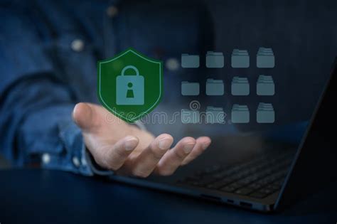 The Business Man Work With Laptop Seek Data Folder Are Locking Icon Floating On Screen Stock