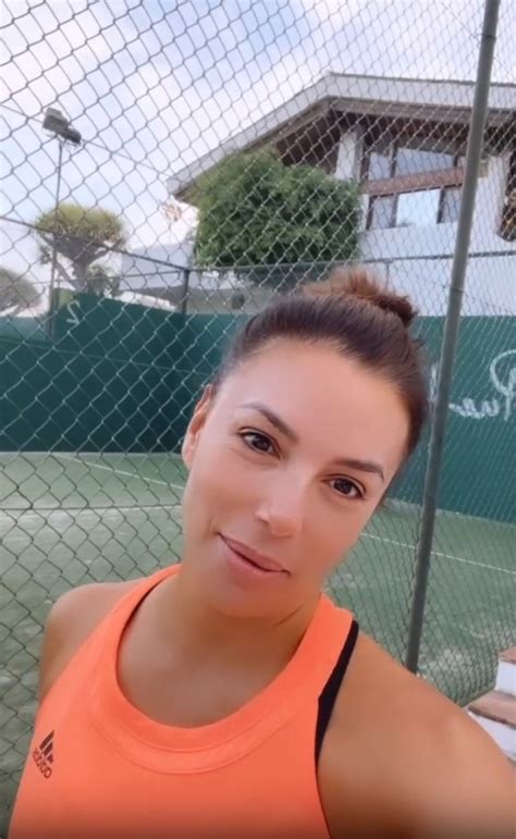 Eva Longoria Shows Off Her Real Thighs And Butt In Tiny Orange Shorts
