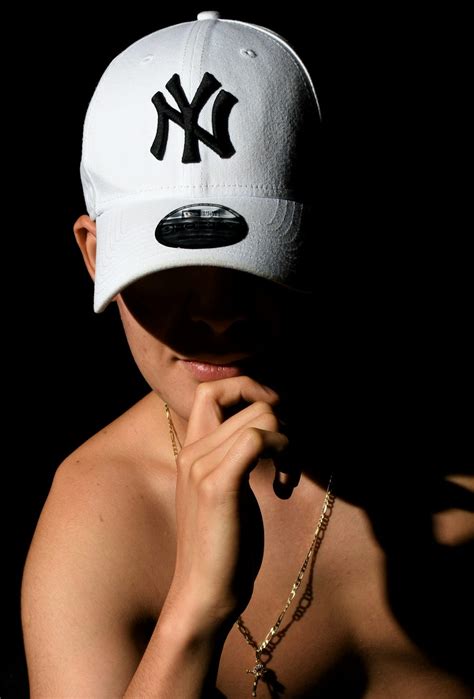 Man Wearing New York Yankees Cap Photo Free Cap Image On Unsplash