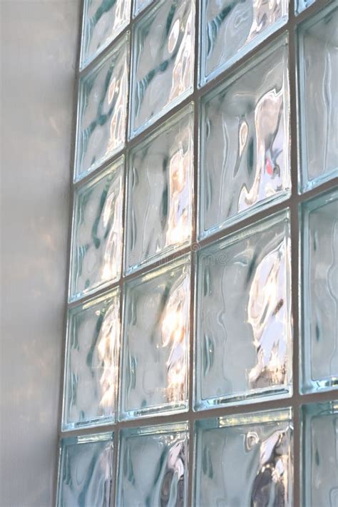 Glass Block Wall With Golden Natural Light Background Interior Design