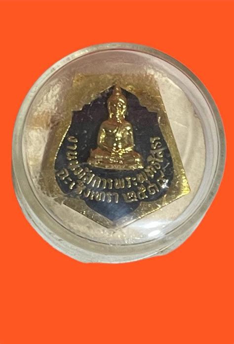 เข็มกลัดติดเนคไทด์ หลวงพ่อโสธร กะไหล่ทองลงยาสีขาว ปี19 Ennxo