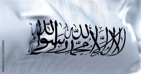 The Flag Of The Islamic Emirate Of Afghanistan Waving In The Wind