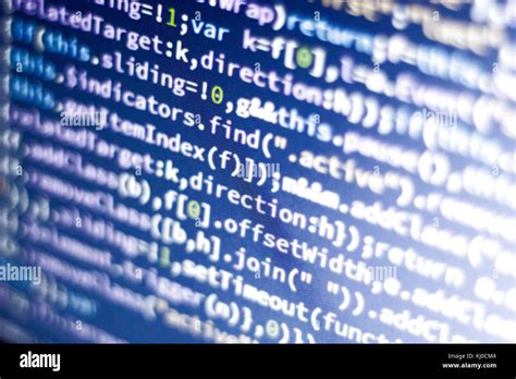 Glowing Minificated Javascript Code Abstract Screen Of Modern Web Developer Hacking Computer