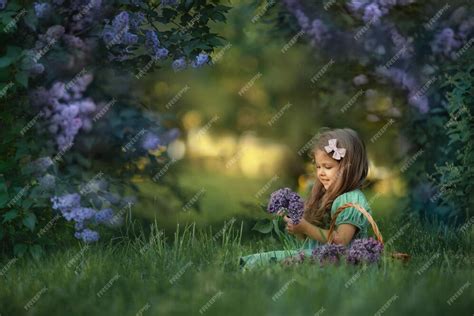 Premium Photo Portrait Of A Girl Sitting In The Garden