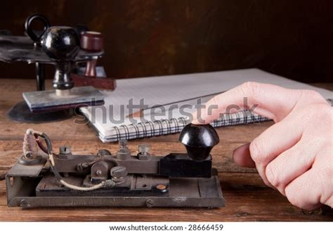 Hand Tapping Morse Code On Antique Stock Photo Edit Now 28666459
